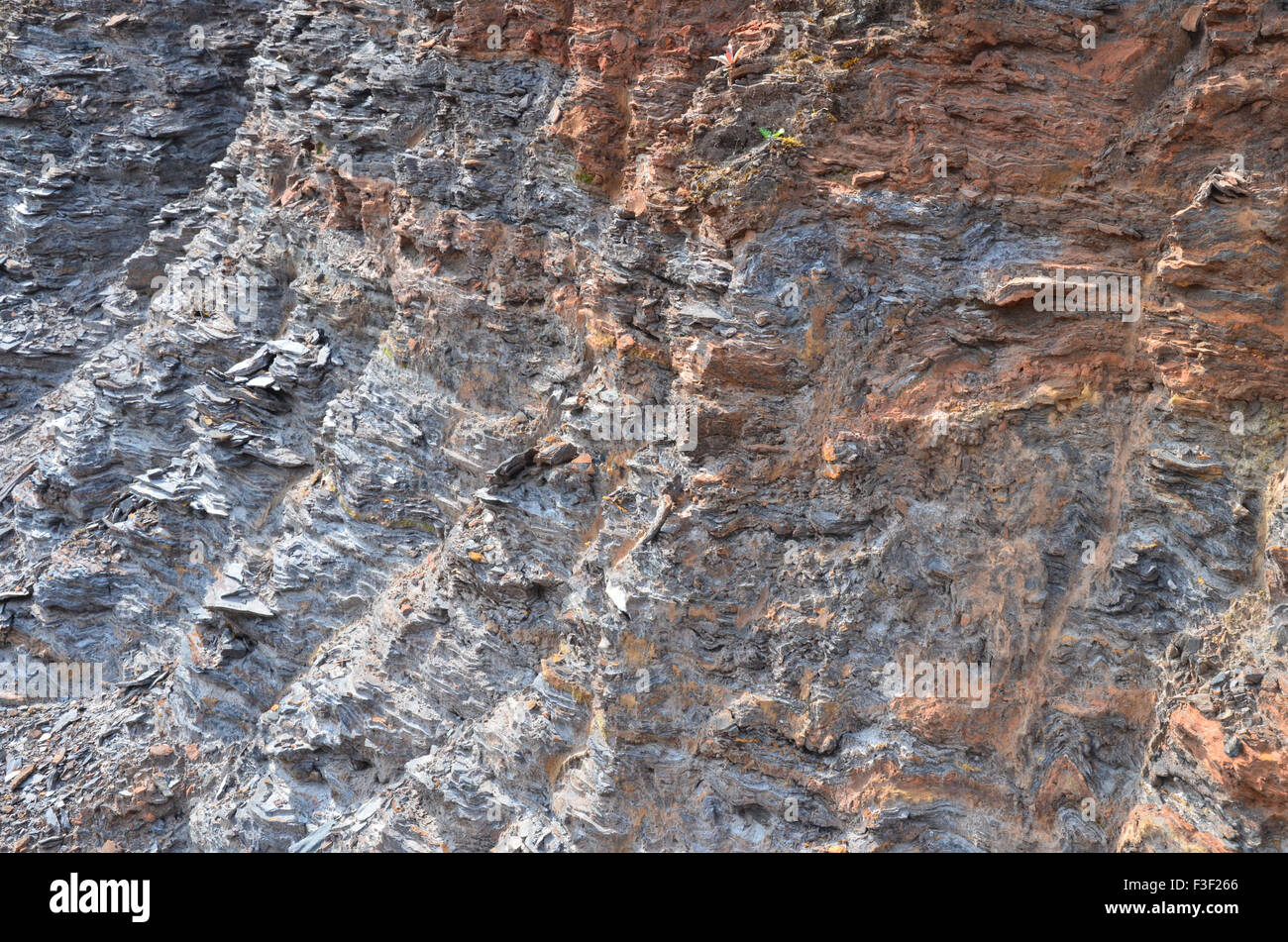 Layers of iron ore formed in the earth Stock Photo - Alamy