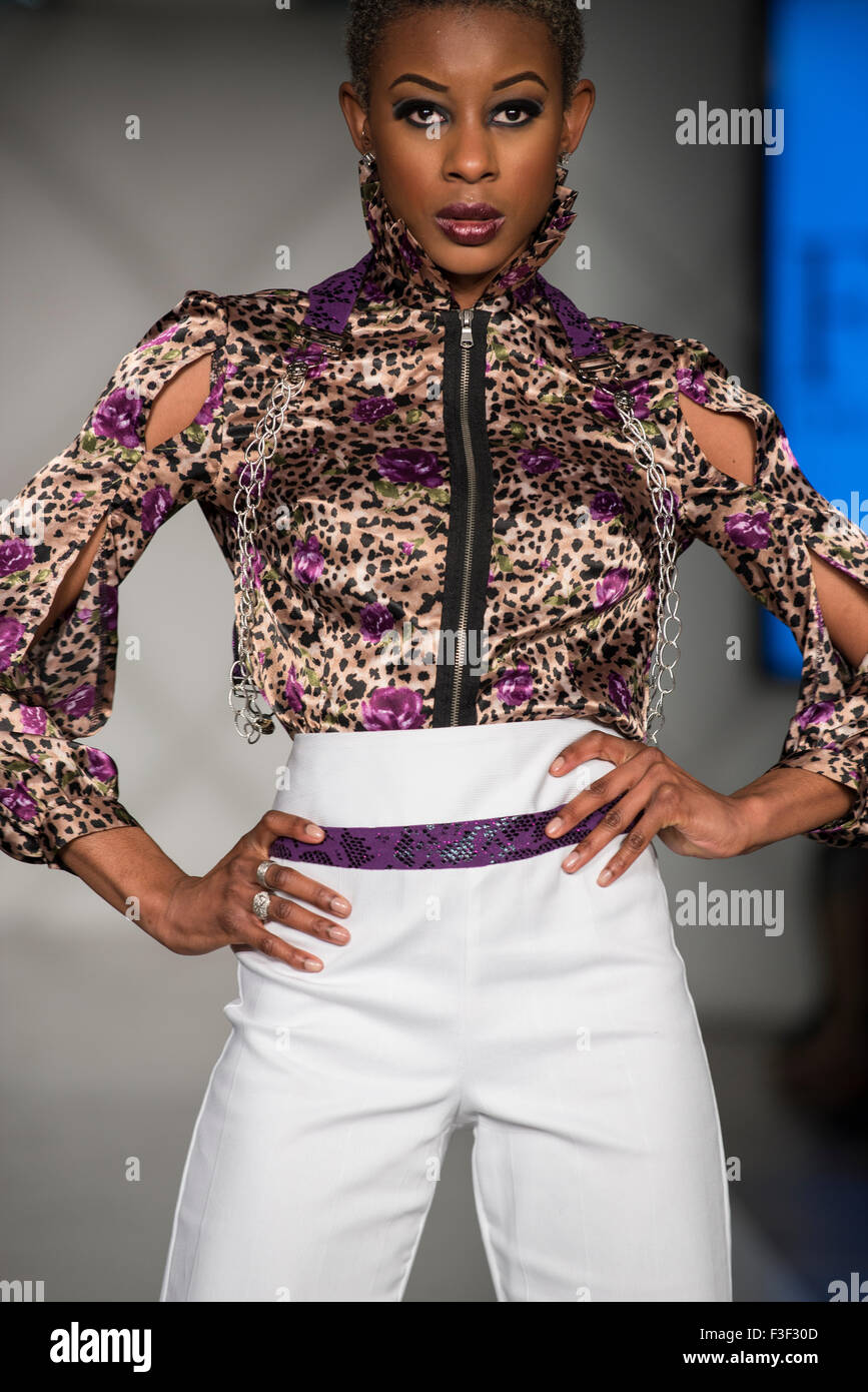 Model poses in a design by Marcella Co. Marcella Jones-Penn (USA ...