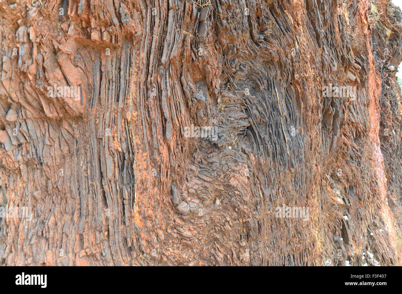 Layers of iron ore formed in the earth Stock Photo - Alamy