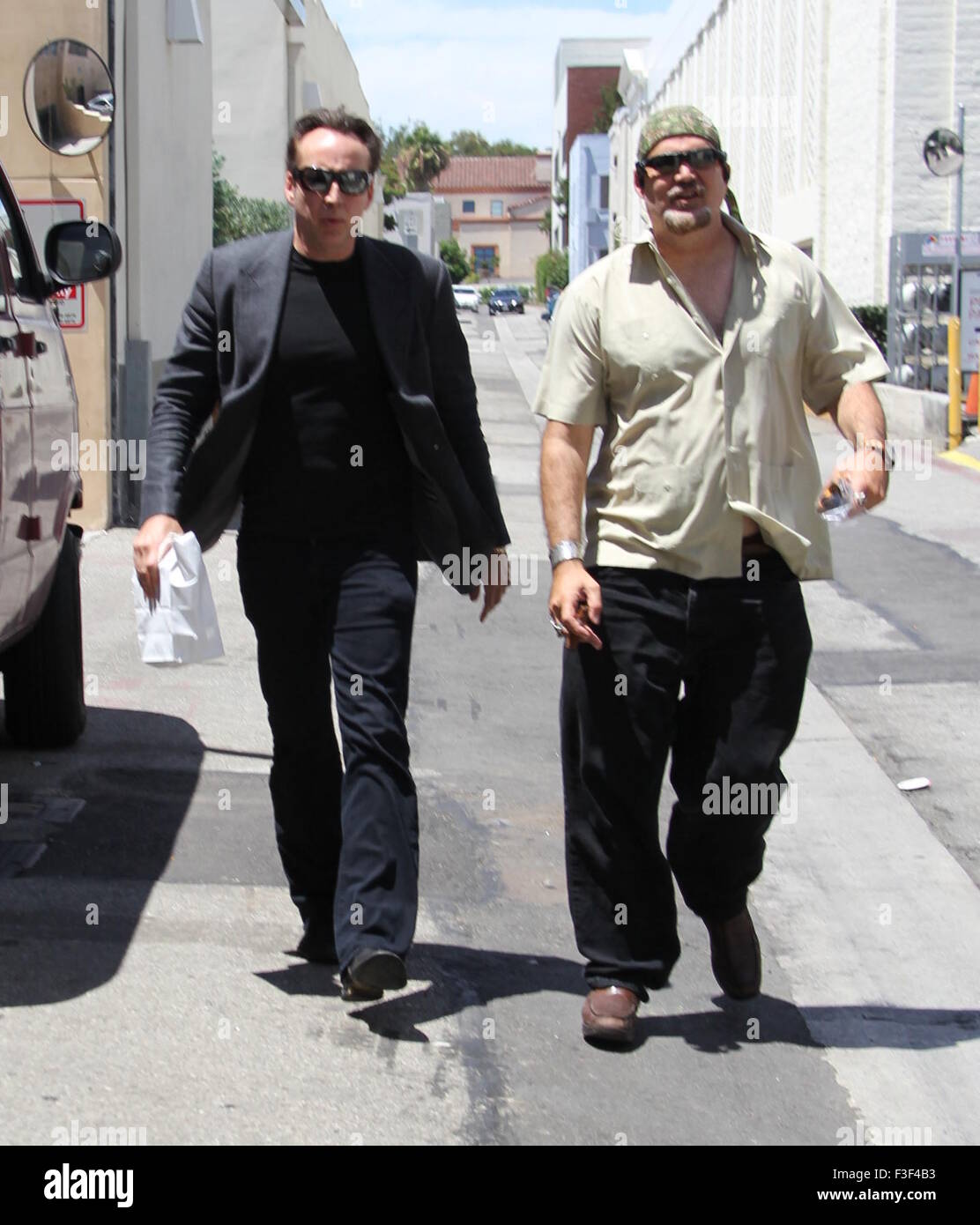 Nicolas Cage out and about in Beverly Hills with his film director ...