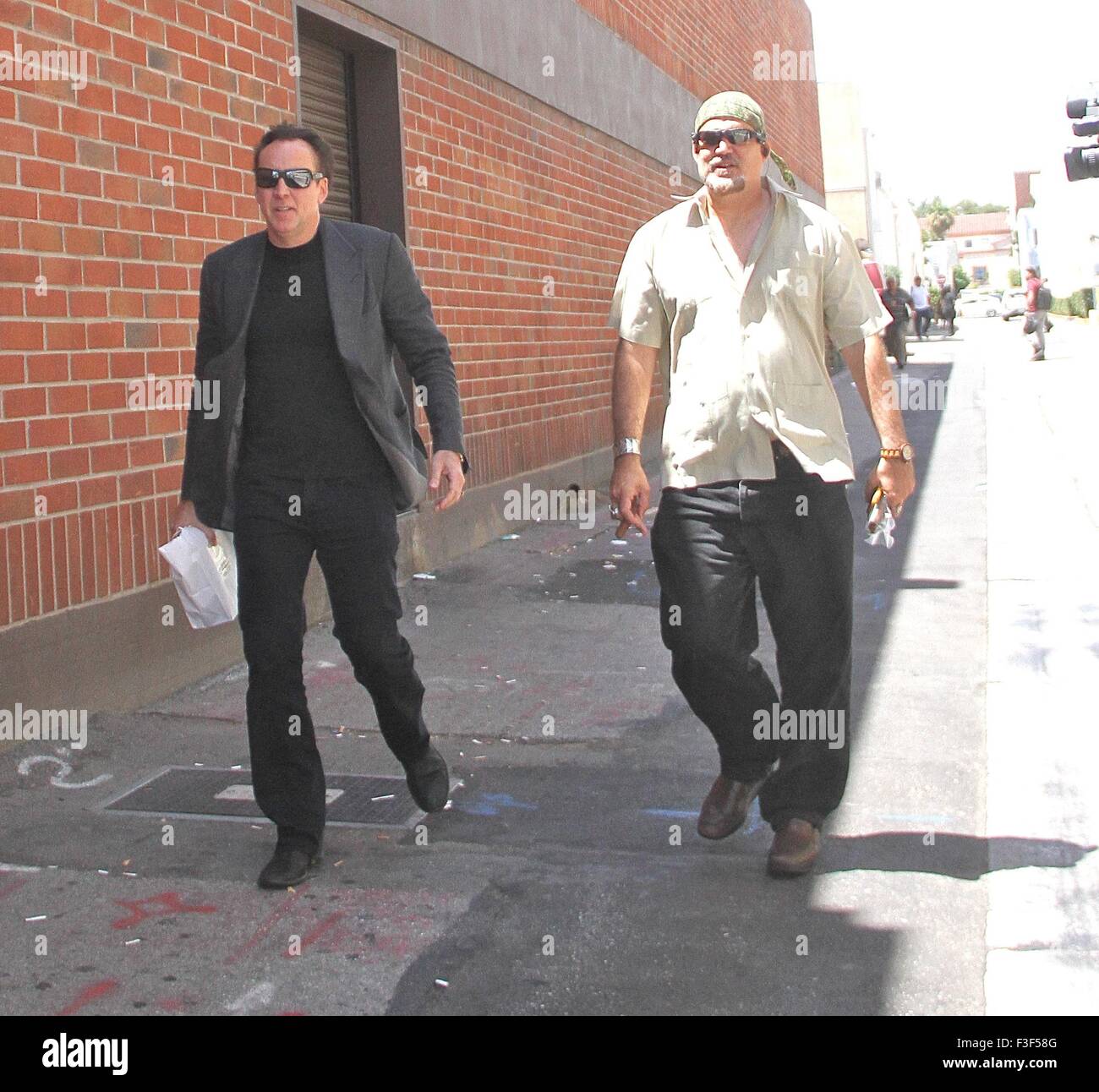 Nicolas Cage out and about in Beverly Hills with his film director ...
