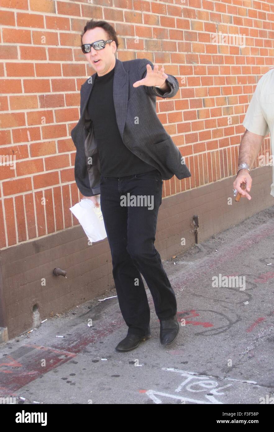 Nicolas Cage out and about in Beverly Hills with his film director ...
