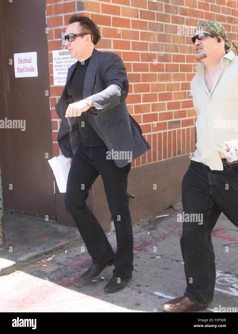 Nicolas Cage out and about in Beverly Hills with his film director ...