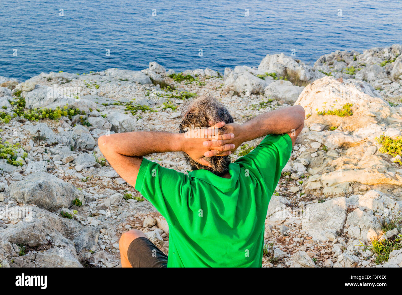 Man folding his hands hi-res stock photography and images - Alamy