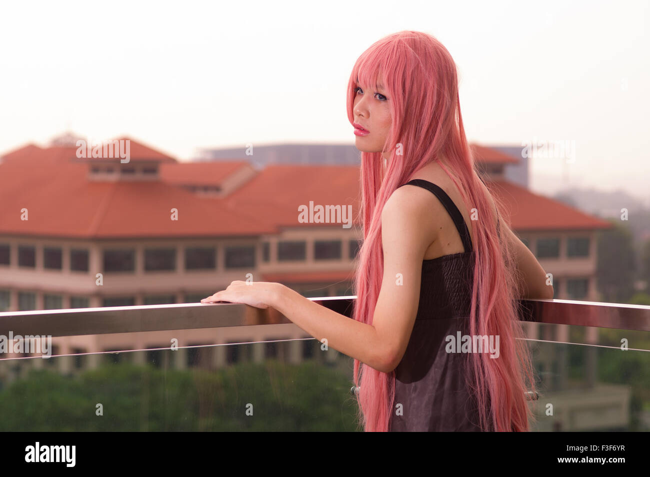 luka megurine crossplayer overlooking a building Stock Photo - Alamy