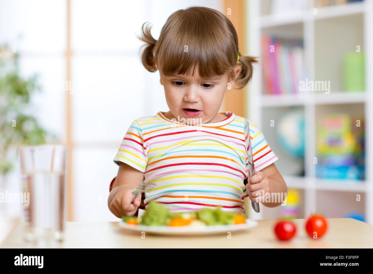 Sad looking child hi-res stock photography and images - Alamy