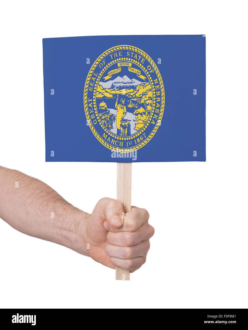 Hand holding small card, isolated on white - Flag of Nebraska Stock ...
