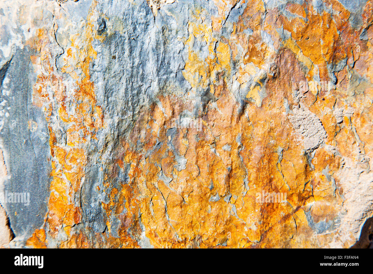 rocks stone and red orange gneiss in the wall of morocco Stock Photo ...
