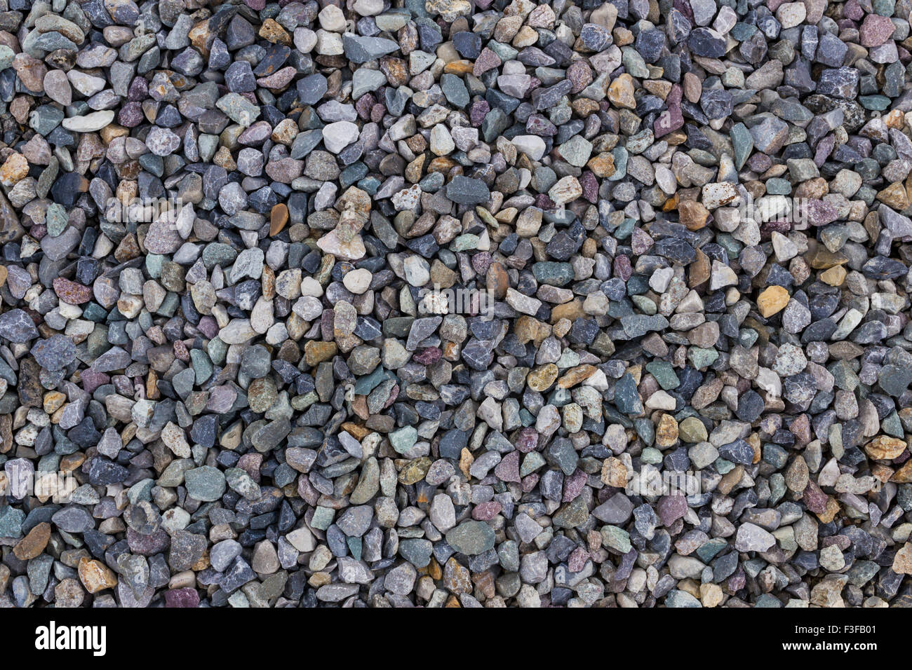 Background of small stones with cool shades Stock Photo - Alamy