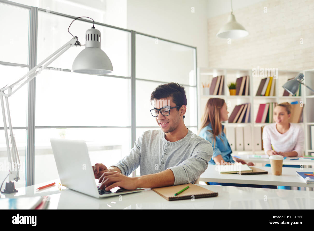 College student typing hi-res stock photography and images - Alamy