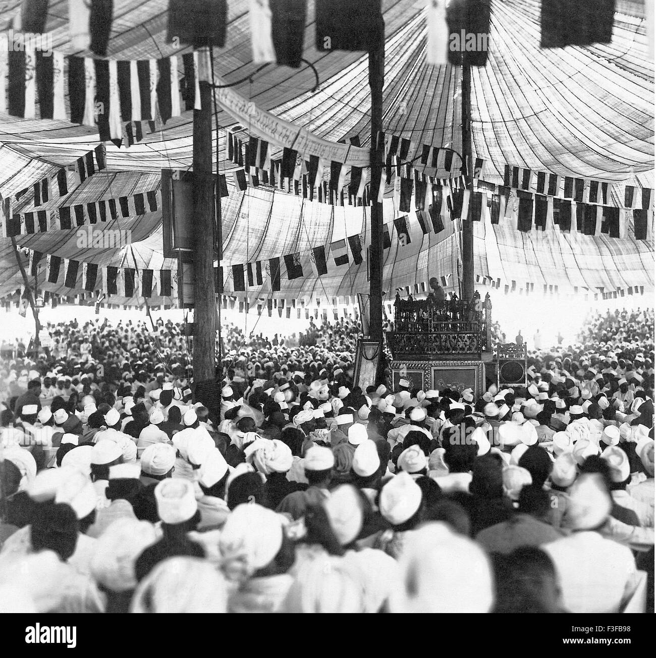 Mahatma Gandhi giving his presidential speech at the opening session of ...