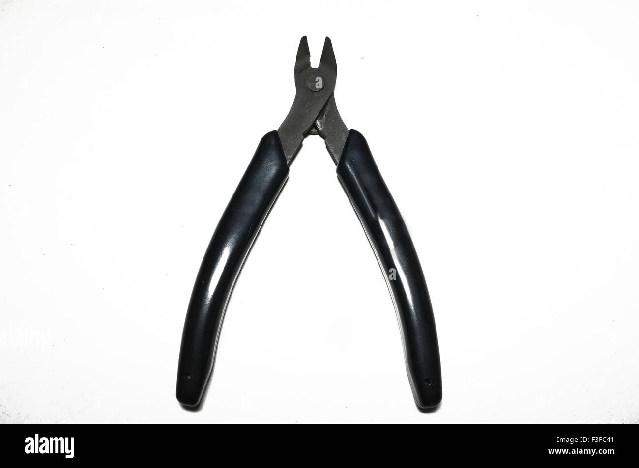 A pair of black pliers isolated on a white background Stock Photo - Alamy