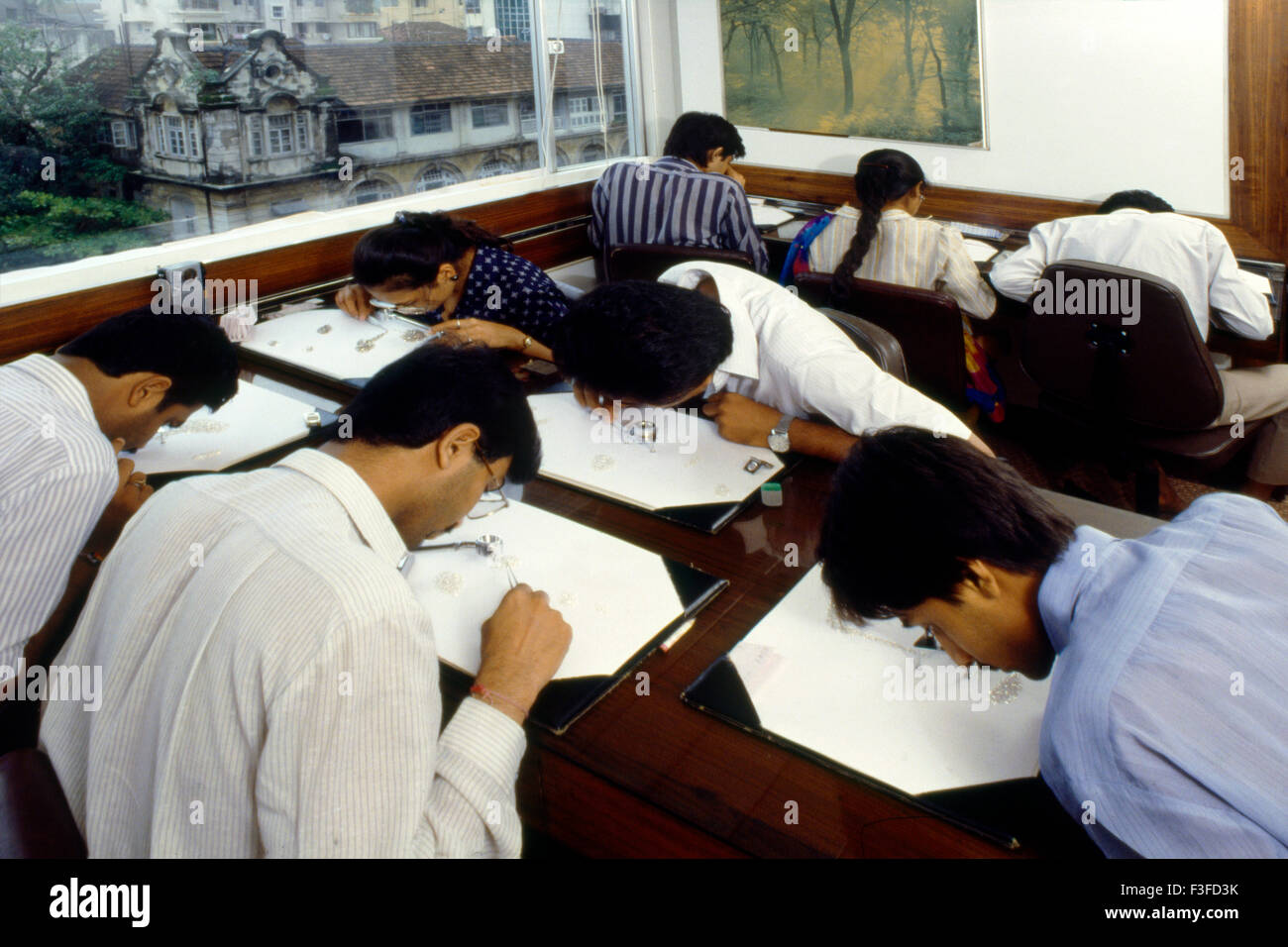 People sorting diamonds at Bombay Mumbai ; Maharashtra ; India Stock ...