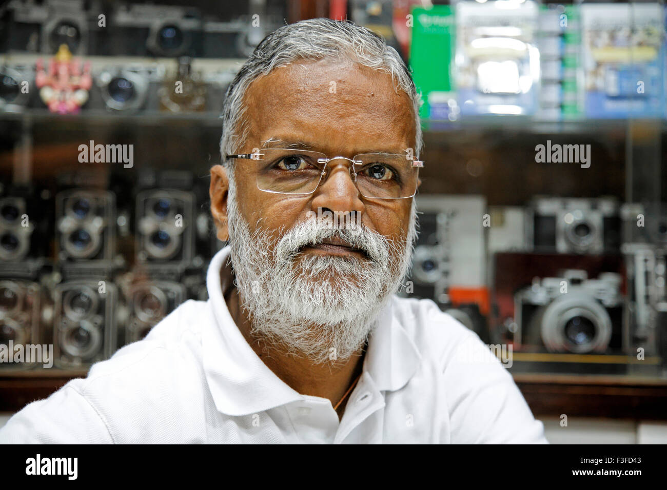 Mr. Anil Dave looking at camera Stock Photo - Alamy