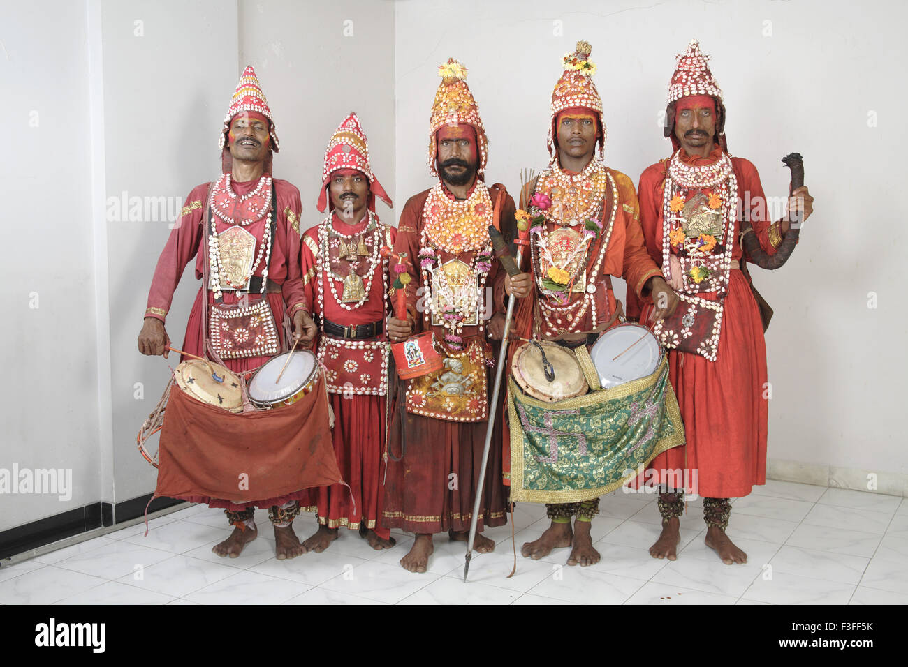 Gondhali from Solapur District playing drums ; Maharashtra ; India MR ...