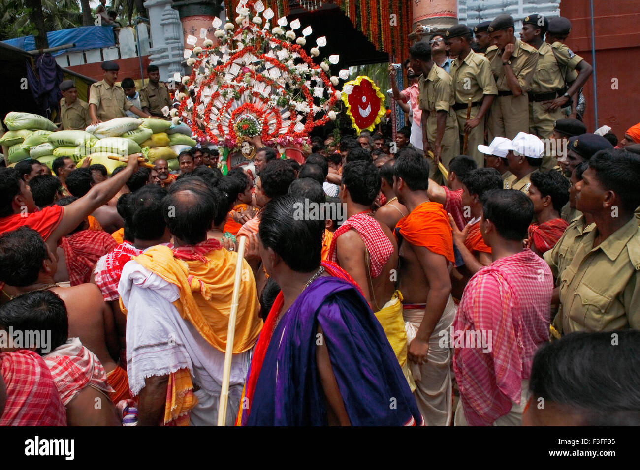 Men carrying idol of god ; Puri ; Orissa ; India Stock Photo - Alamy