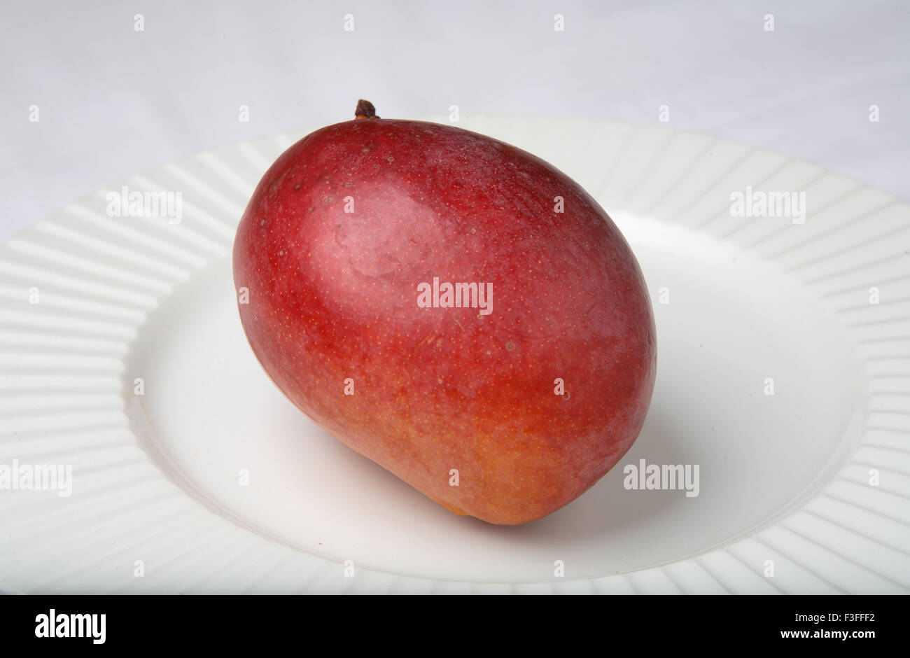 Fruit ; Red Mango ; Sweet ; Sour test ; Colourful ; One mango in a ...