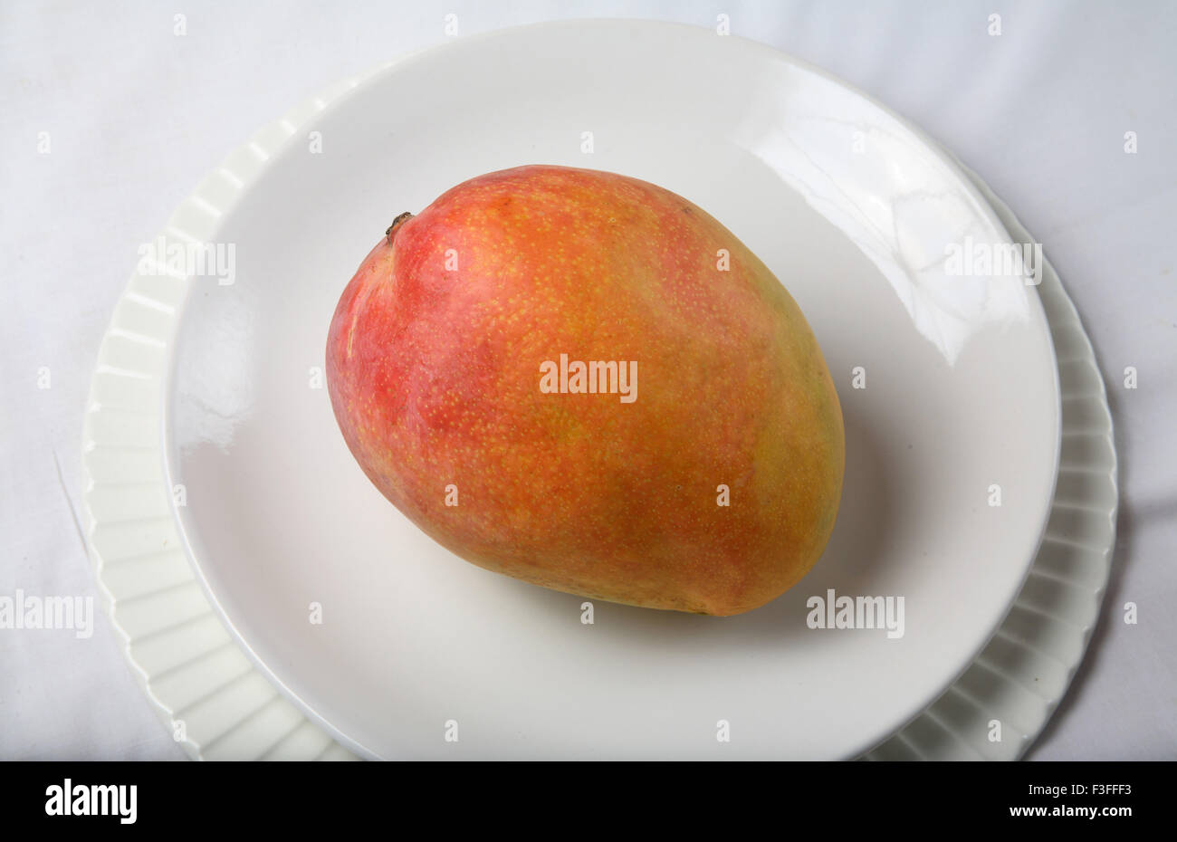 Fruit ; Red Mango ; Sweet ; Sour test ; Colourful ; One mango in a ...