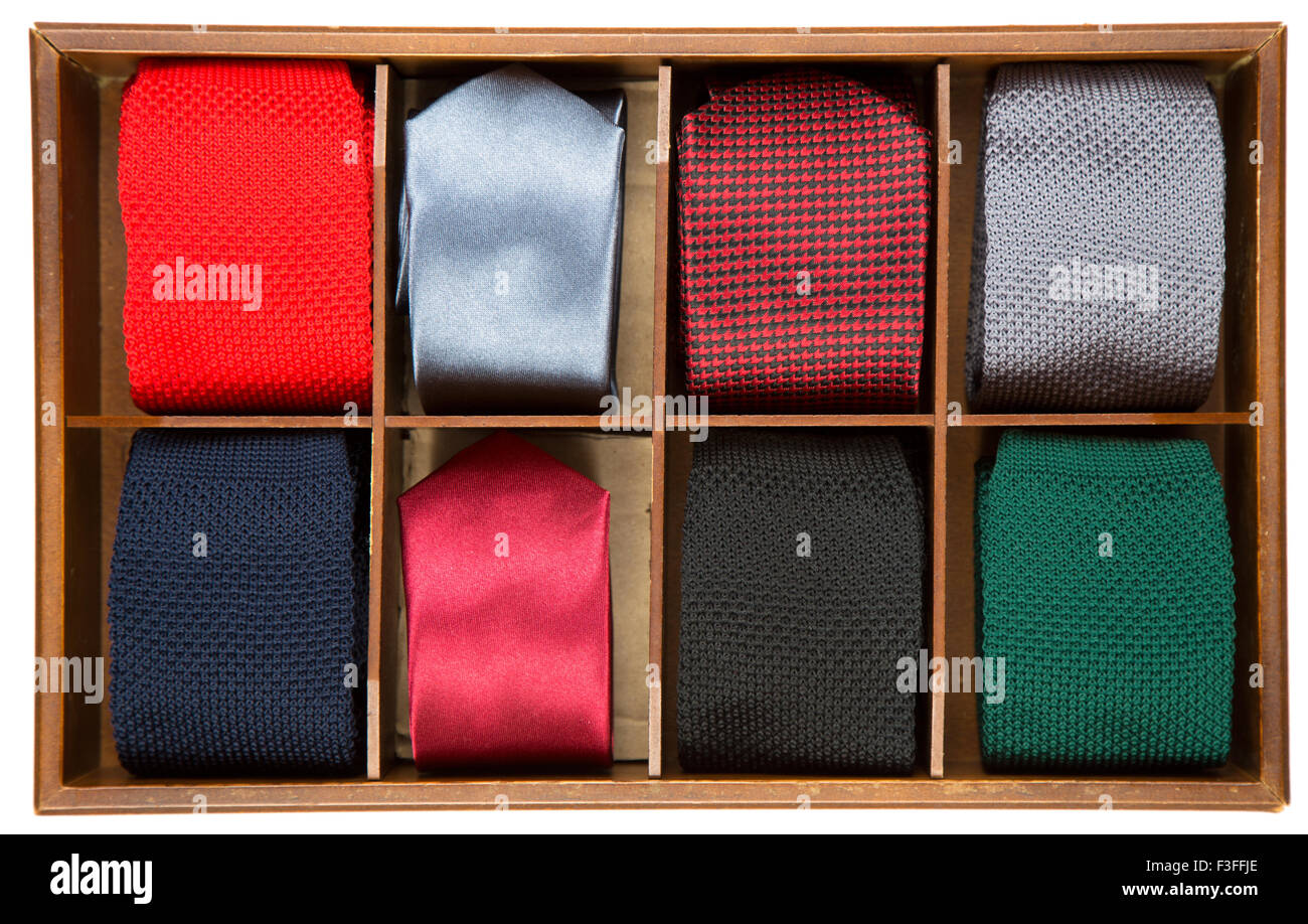 Different patterns and colours of man ties in a wooden box,Isolated on ...