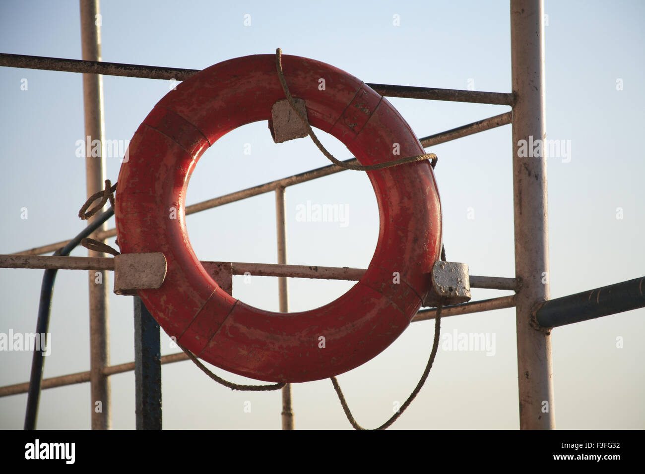 Orange colored life guard ring on the ferry boat ; Goa ; India Stock ...