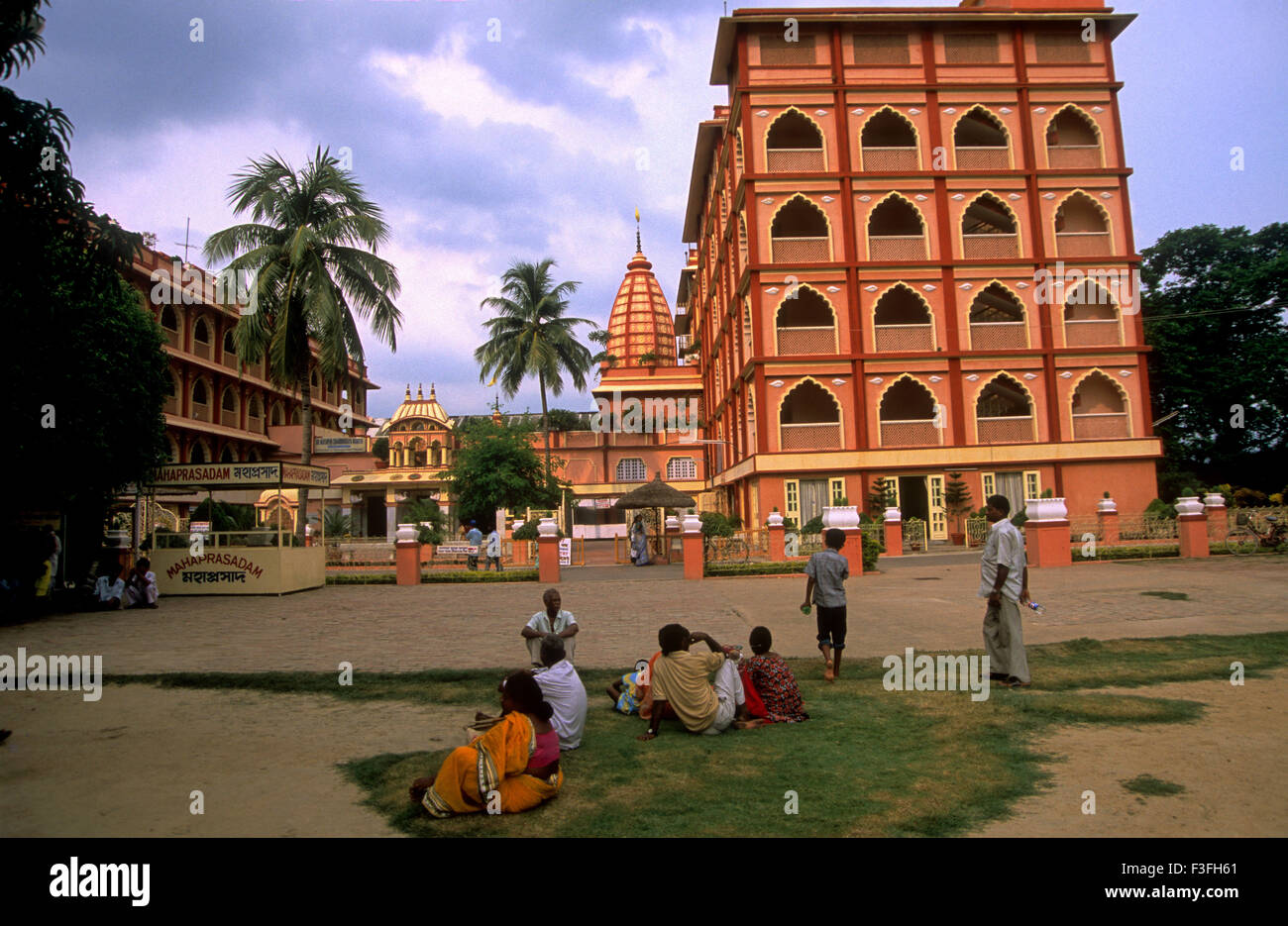 People sitting at Mayapur temple ; West Bengal ; India Stock Photo - Alamy