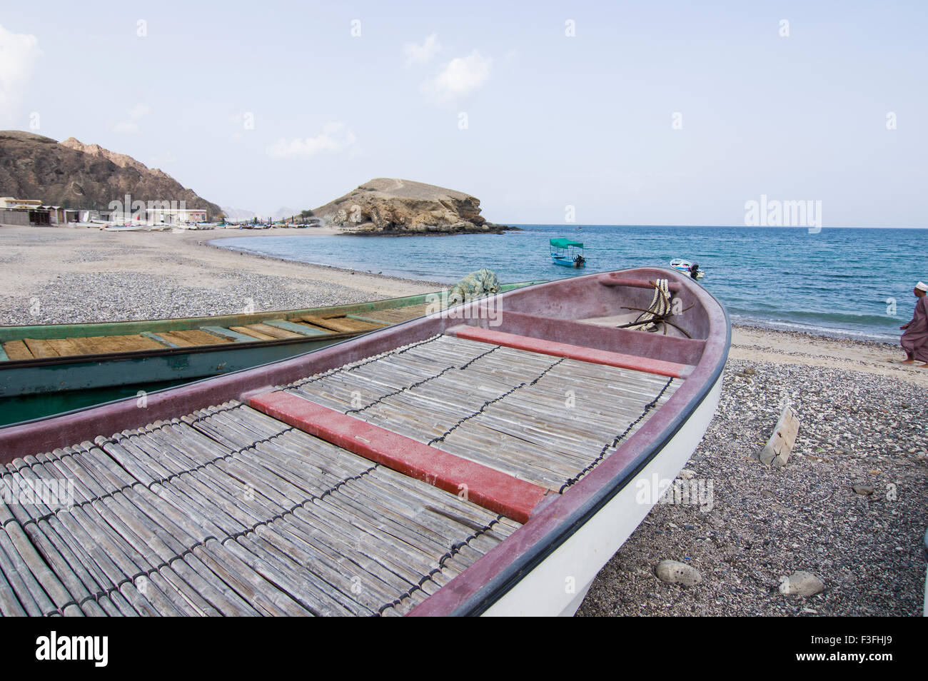 Boat on the beach in a beach village near Muscat in the Sultanate of ...