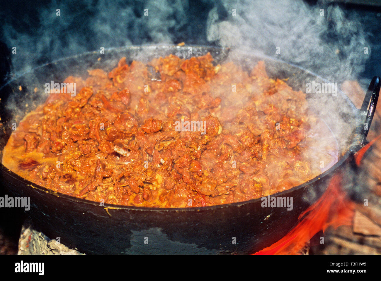 Chicken cooking ; India ; Asia Stock Photo - Alamy