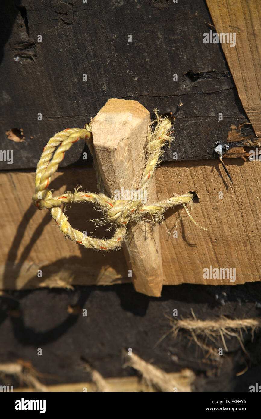 rope tied wood closeup, Kerala, India, Asia Stock Photo - Alamy