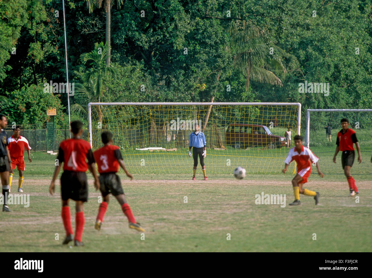 Playing football ; Calcutta ; Kolkata ; West Bengal ; India ; Asia ...