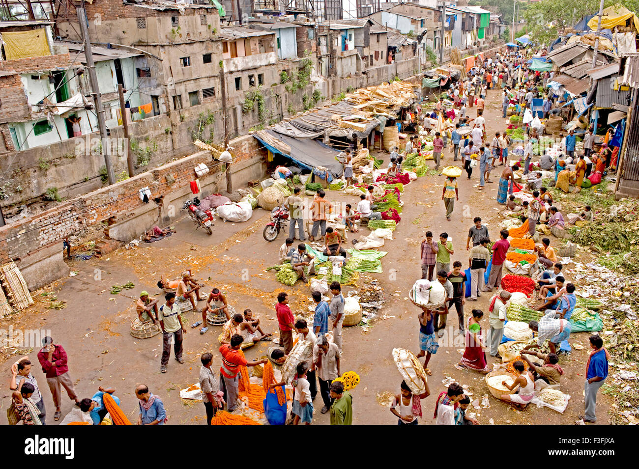 Mullick bazaar flower market scene from the Howrah Bridge ; Kolkata or ...