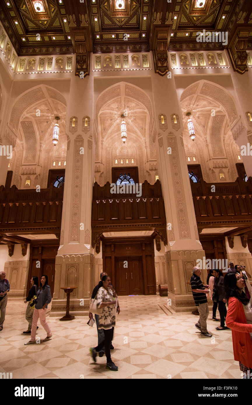 Lobby with high arches and an ornate wooden ceiling in the Royal Opera ...
