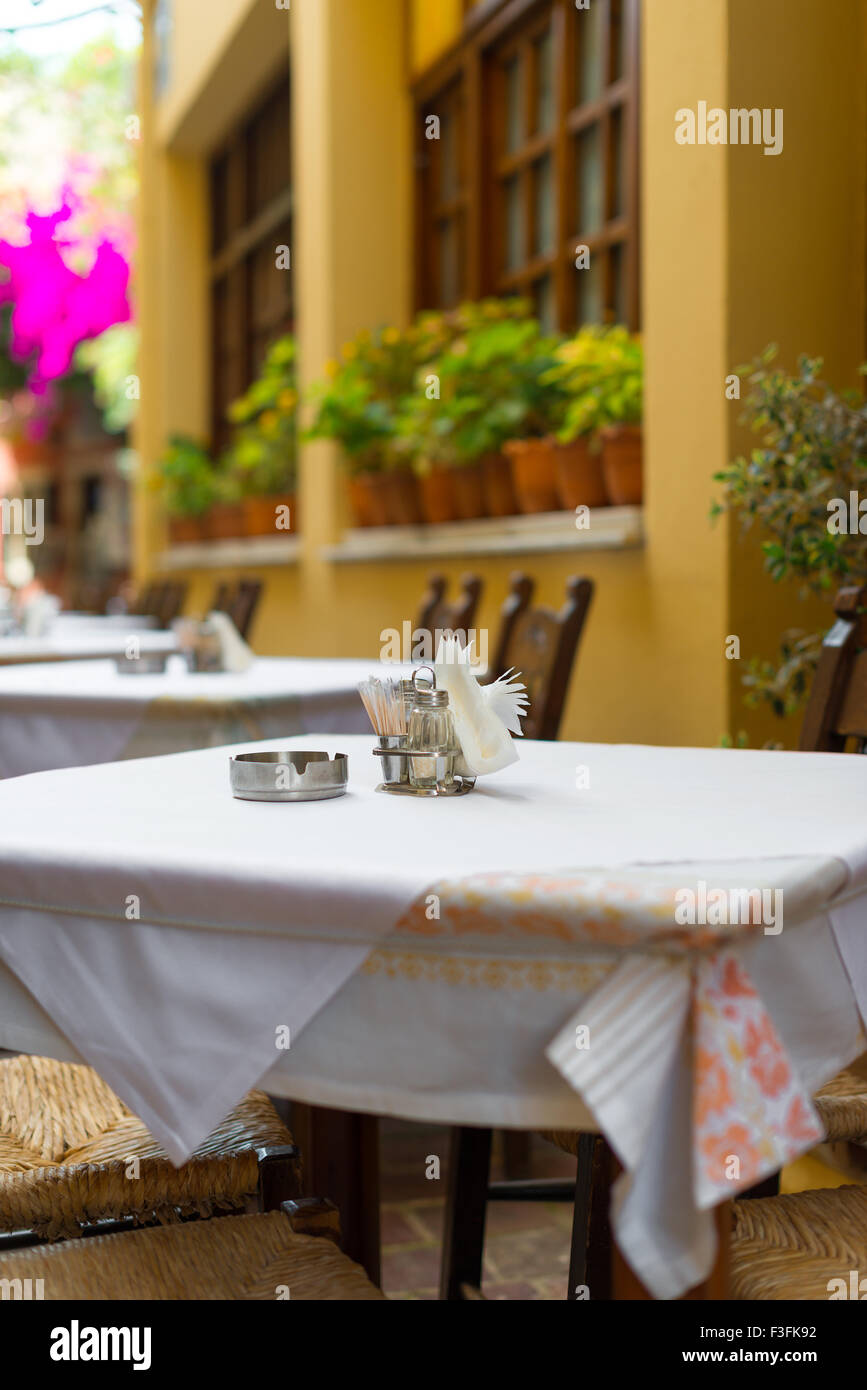 Mediterranean restaurant terrace exterior with chairs Stock Photo - Alamy