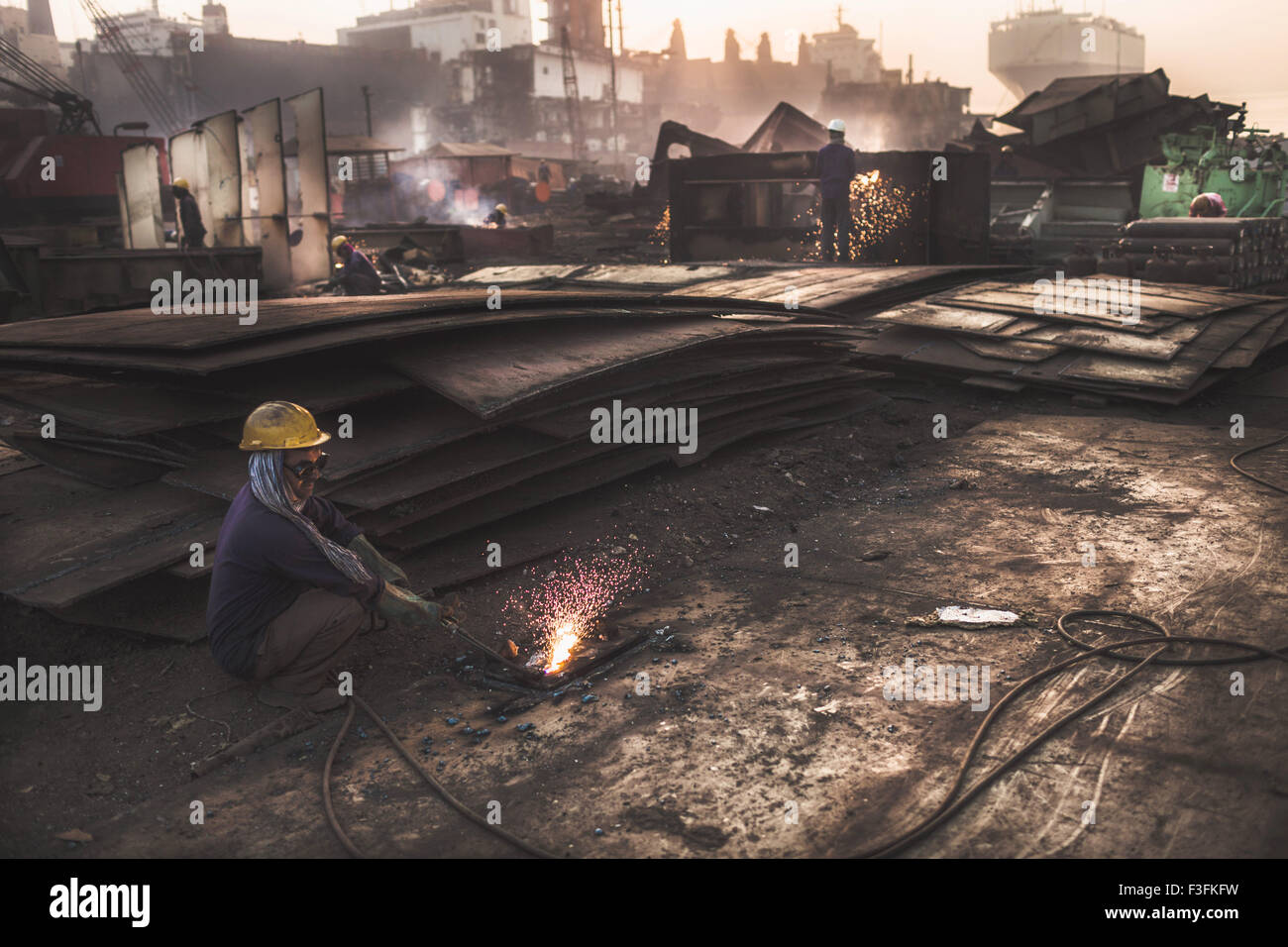 Shipbreaking Yards of Alang Stock Photo - Alamy