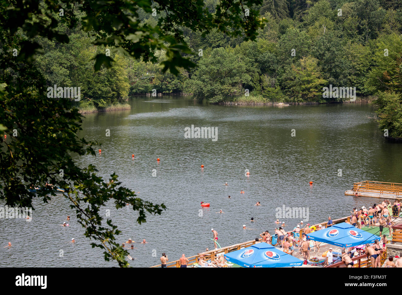Crowd of people at the Bear Lake (Lacu Ursu) in Sovata, Transylvania ...