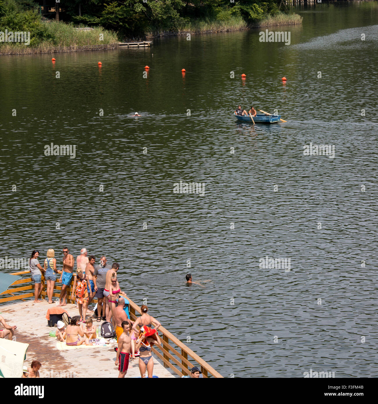 Crowd of people at the Bear Lake (Lacu Ursu) in Sovata, Transylvania ...