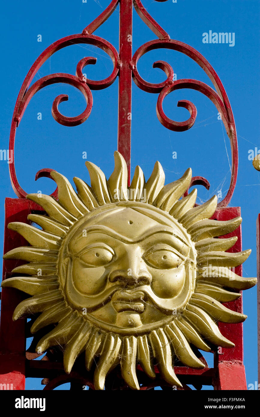 Sun statue on door of City palace museum ; Udaipur ; Rajasthan ; India ...