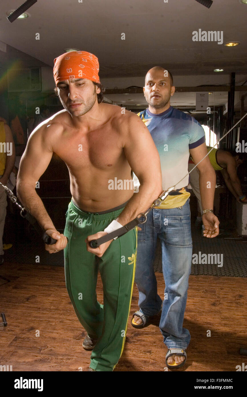 Bollywood Hindi film actor Saif Ali Khan with gym trainer Satya NO MR ...