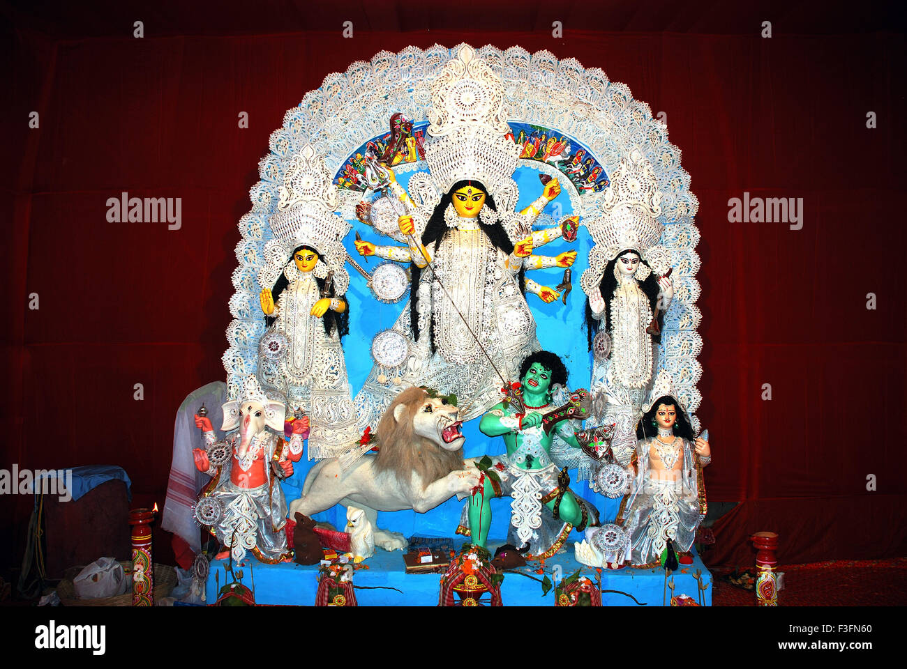 Durga clay model with statues of kartikeya ganesha and lakshmi ...