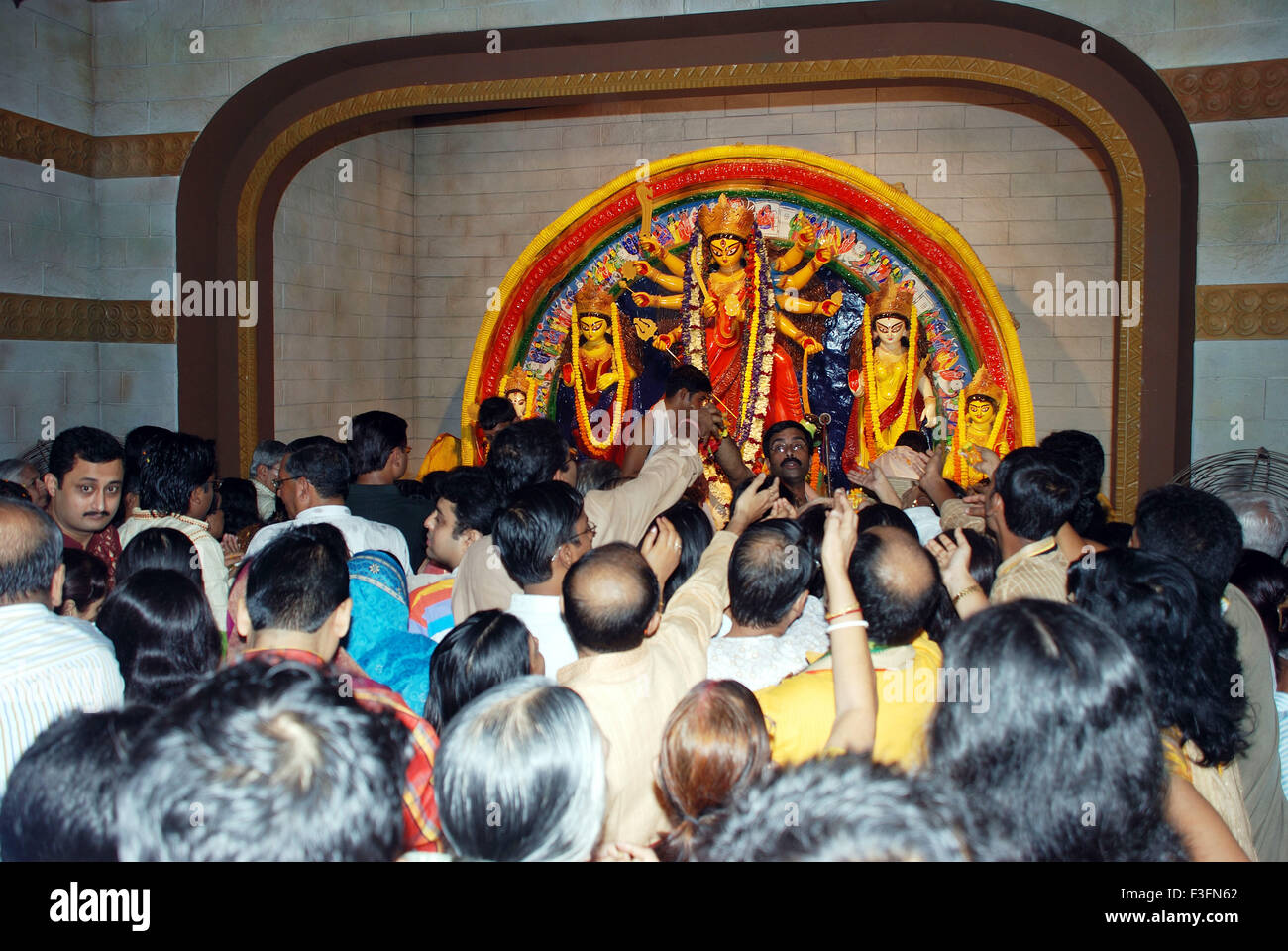 Durga clay model and devotes on Durga puja Stock Photo - Alamy