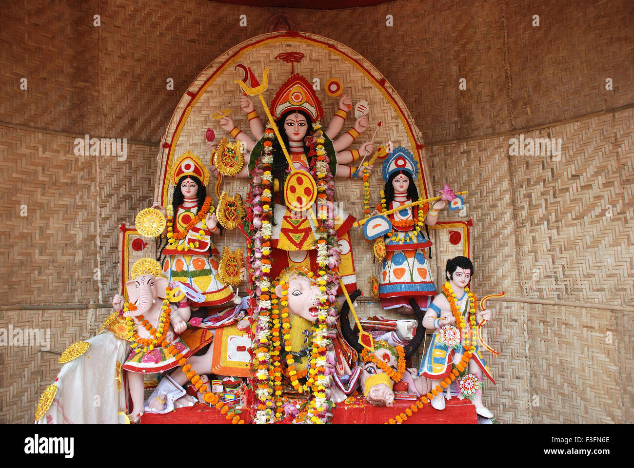 Durga clay model with statues of kartikeya ganesha and lakshmi ...