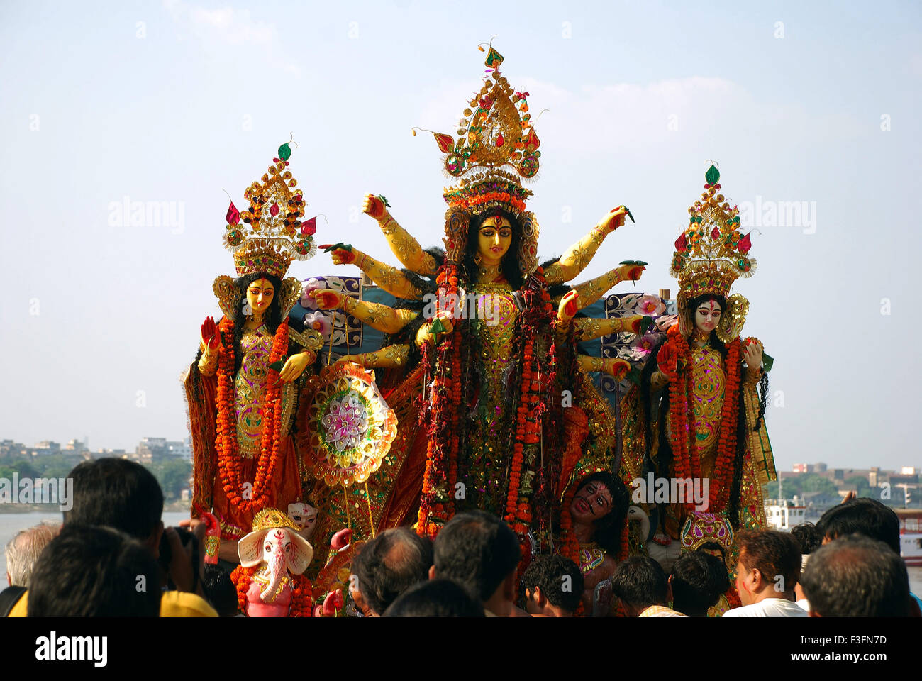 Durga clay model with statues of kartikeya ganesha and lakshmi ...