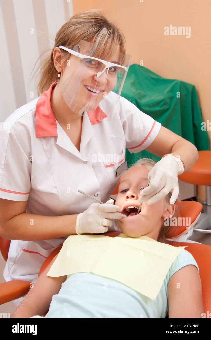 Teenage girl at a dentist Stock Photo - Alamy