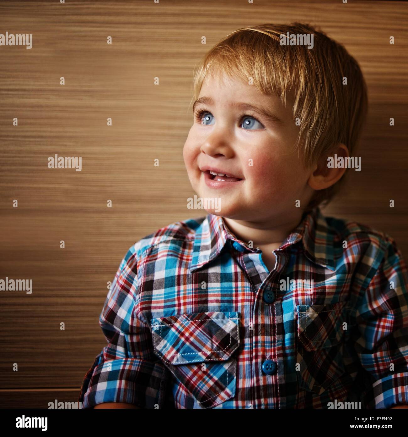 Cute smiling little boy in checkered shirt Stock Photo - Alamy