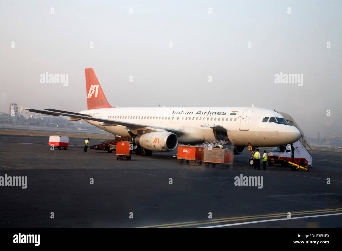 Indian airline's flight is preparing to take off on runway at ...