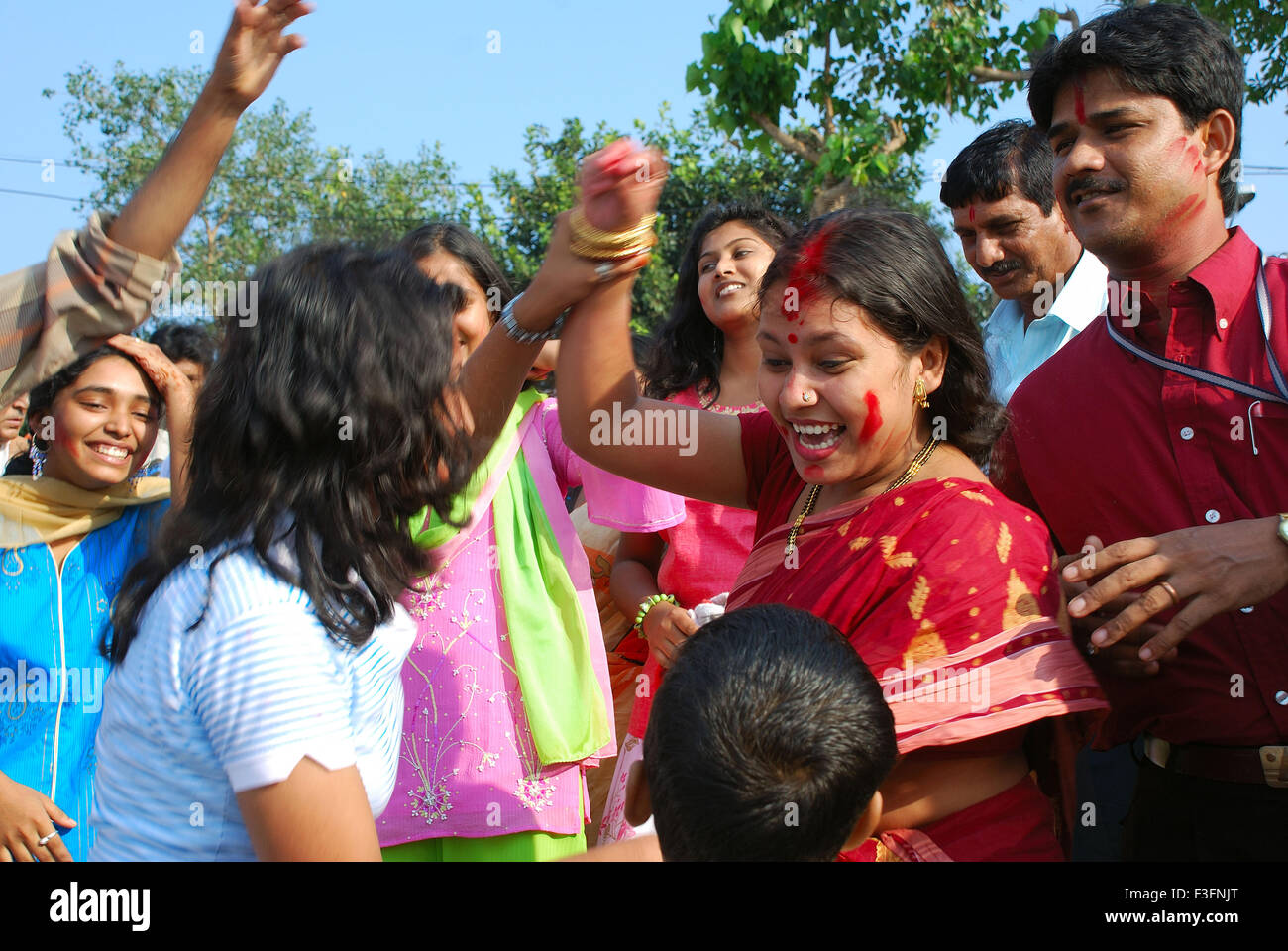 Devotees dancing on durga immersion Stock Photo - Alamy
