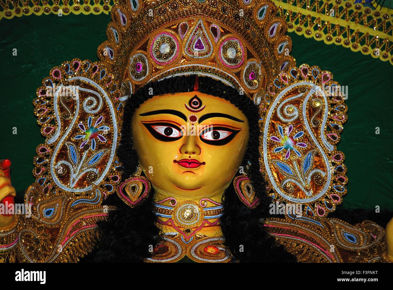 Decorative Durga clay model showing third eye open on Durga puja Stock ...