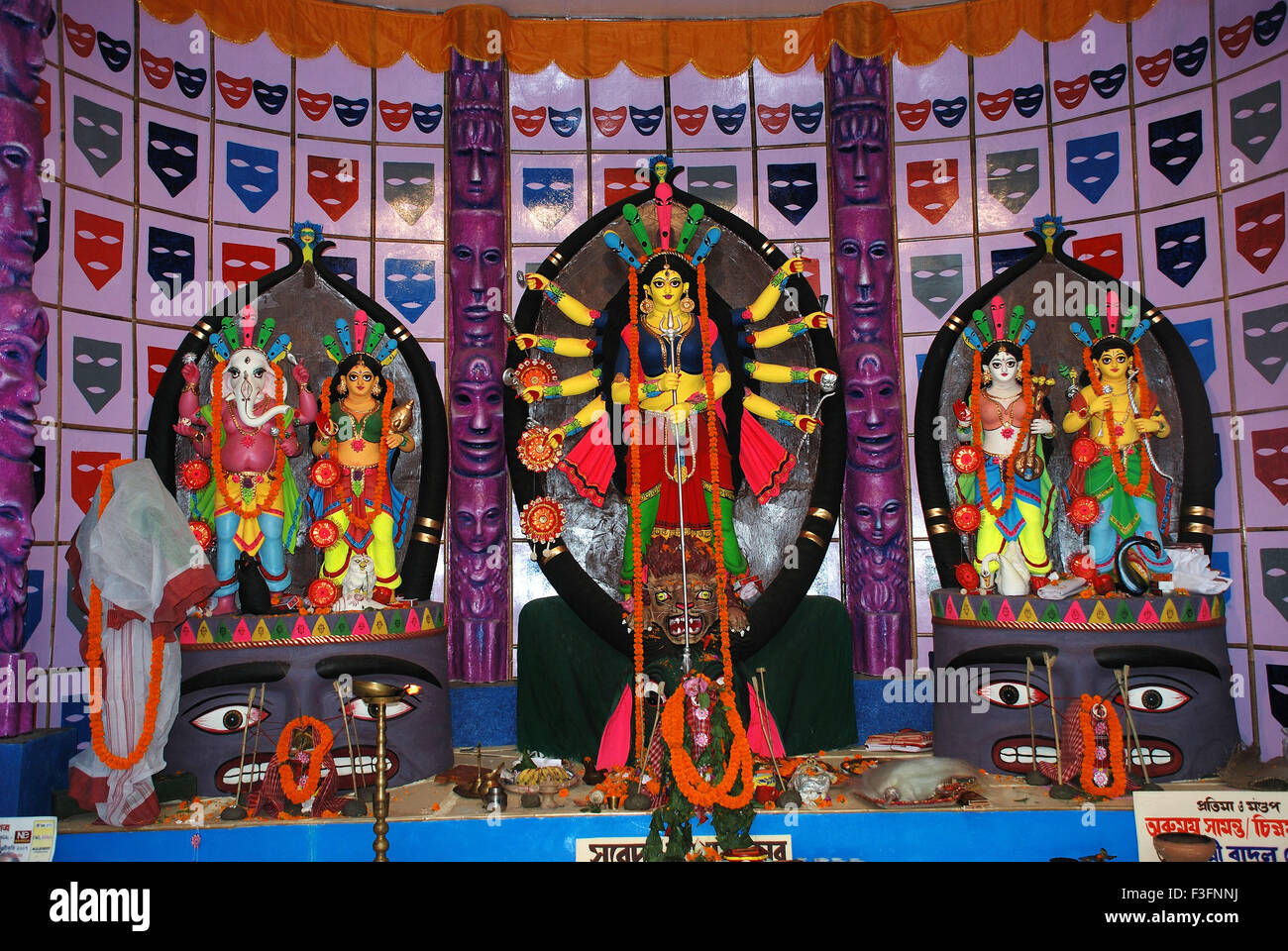 Durga clay model with statues of kartikeya ganesha and lakshmi ...