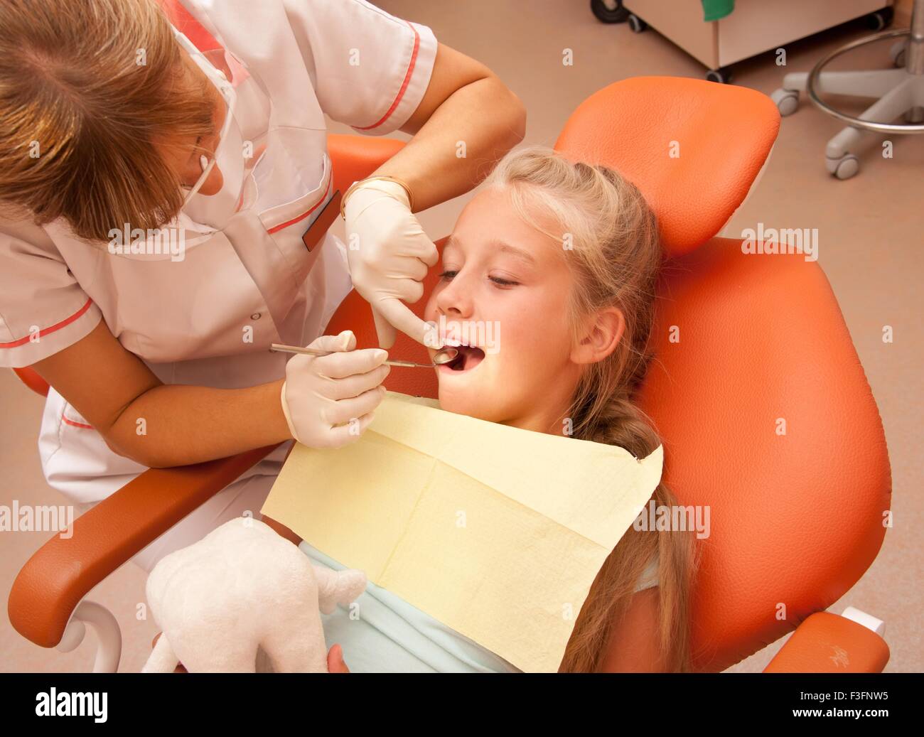 Teenage girl at the dentist Stock Photo - Alamy
