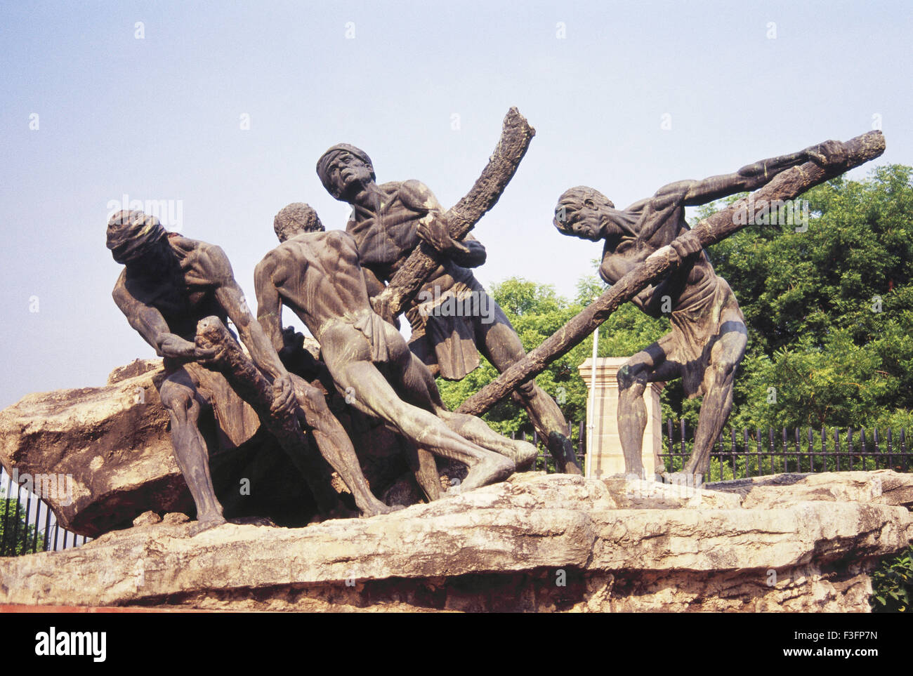 Sculpture in steel of people working outside modern art museum ; New ...
