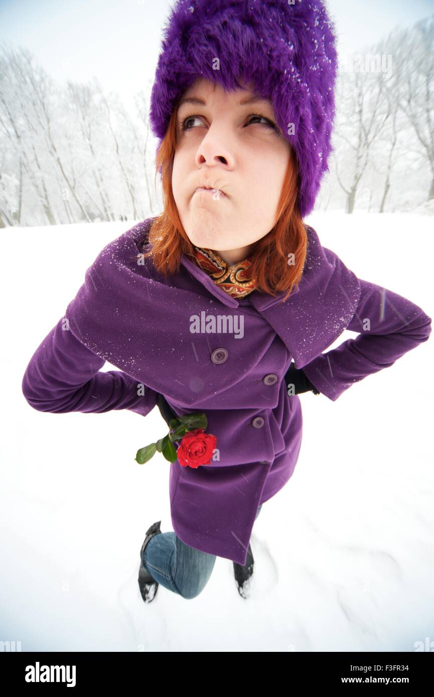 Funny girl with a red rose Stock Photo - Alamy